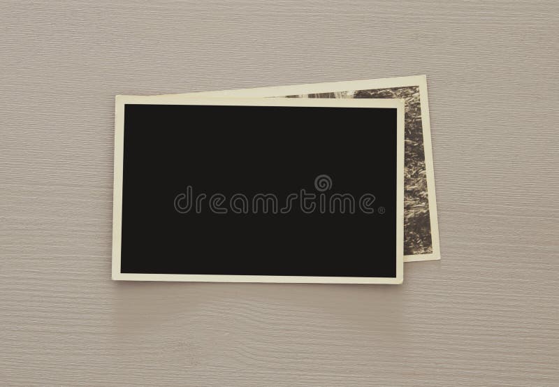 Top View of Blank Photo Frames on Wooden Background. Stock Photo ...
