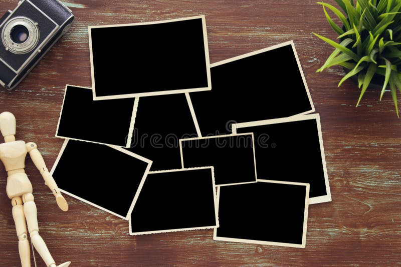 Top View of Blank Photo Frames on Wooden Background Stock Image - Image ...