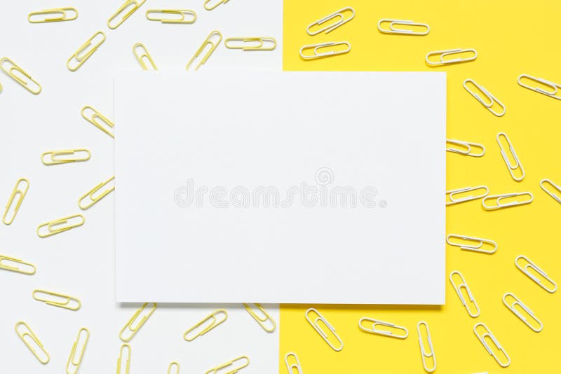Top View of Blank White A4 Paper with Yellow and White Paperclips ...