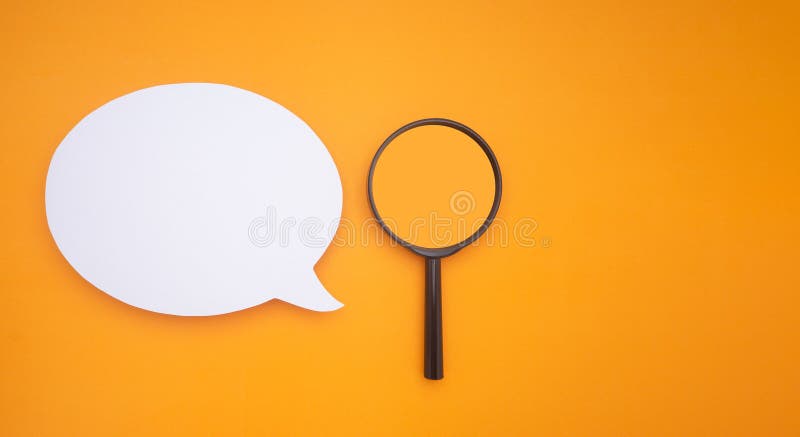 Top View of a Blank White Speech Bubble and a Magnifying Glass Isolated ...