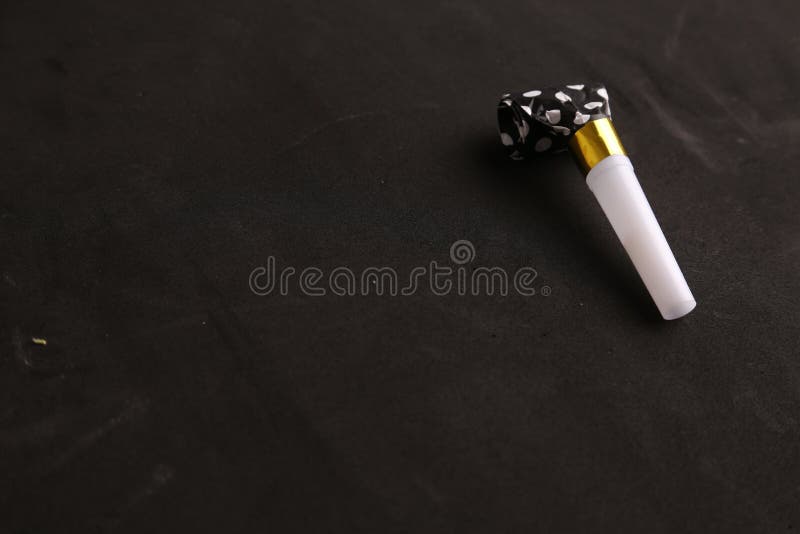 Top View of Blowout Whistle Isolated on a Black Background Stock Photo ...