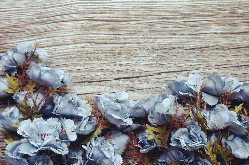 Beautiful Blue Flower Frame with Space for Copy on Wooden Background ...