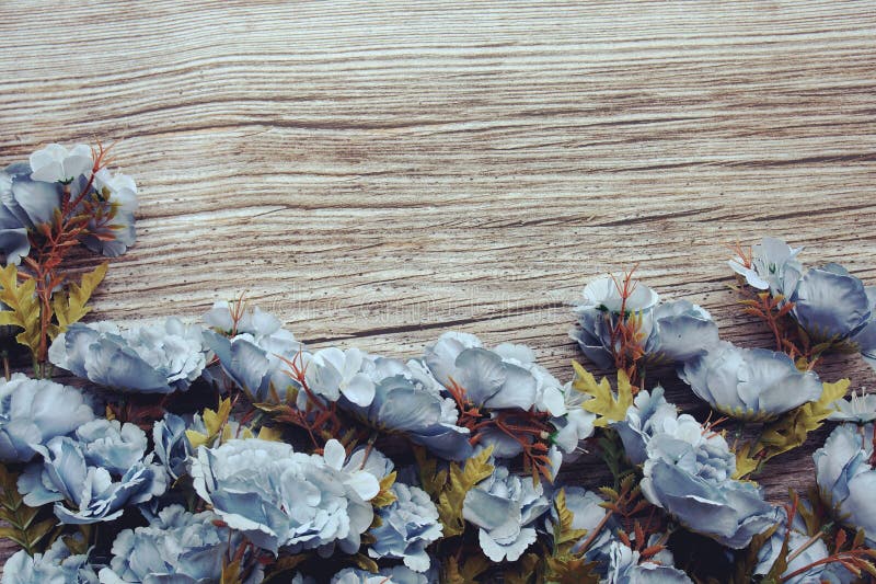 Beautiful Blue Flower Frame with Space for Copy on Wooden Background ...