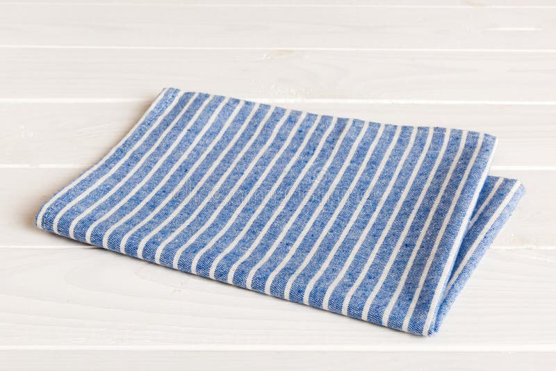 Top View with Blue Kitchen Napkin Isolated on Table Background. Folded ...