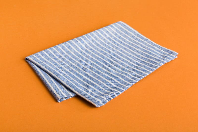 Top View with Blue Kitchen Napkin Isolated on Table Background. Folded ...