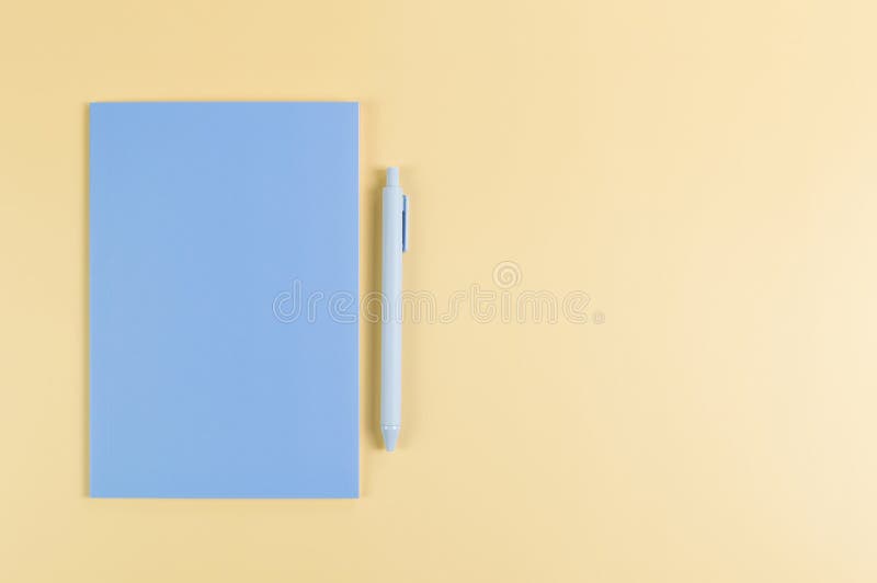 Top View of Blue Notebook, Blue Pen on Yellow Background. School ...