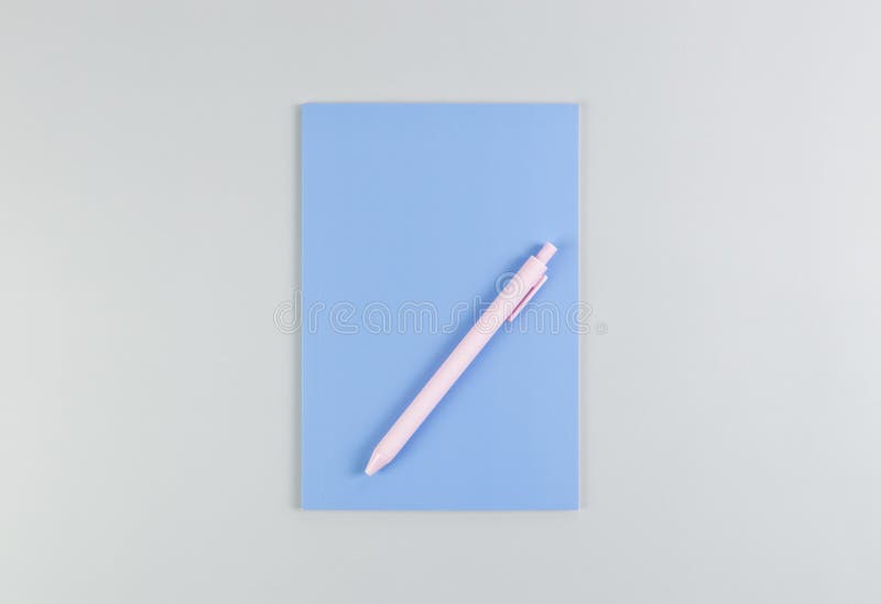 Top View of Blue Notebook, Pink Pen on Grey Background. School, Office ...