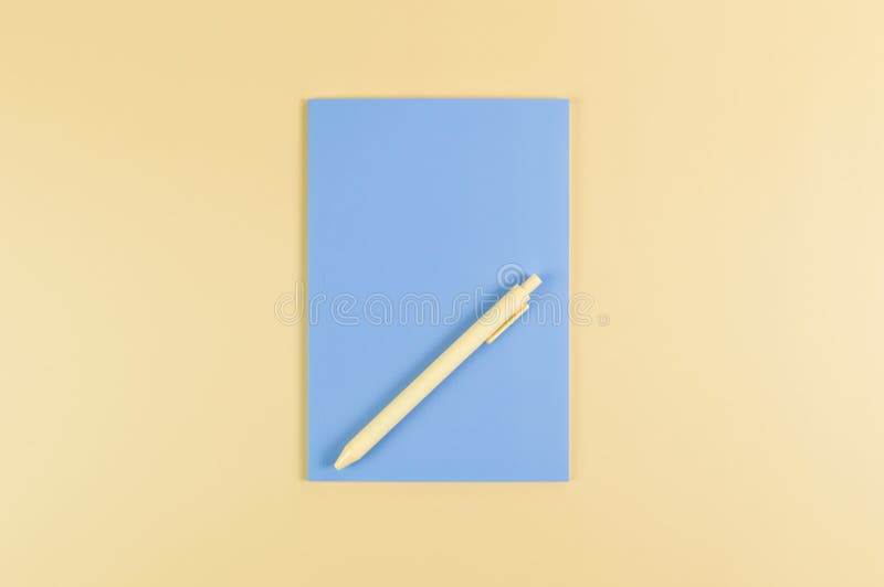 Top View of Blue Notebook, Yellow Pen on Yellow Background. School ...