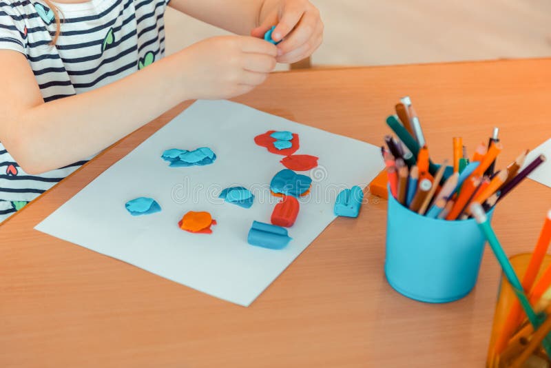 Top View of Blue Plasticine Pieces on Paper Stock Photo - Image of ...