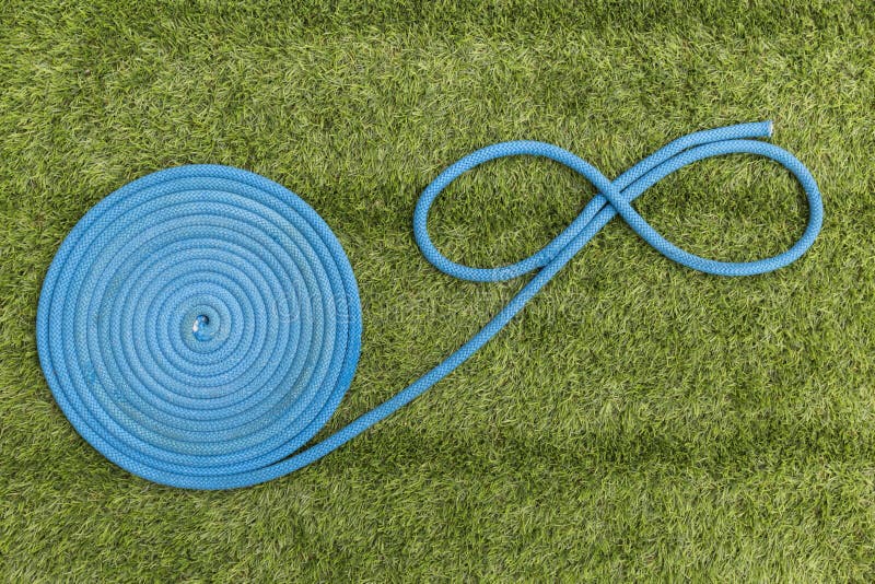 Top View of a Blue Rope Forming the Infinity Symbol on the Grass Stock ...