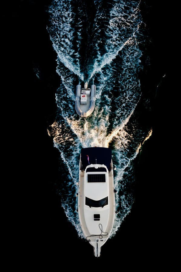 A Tug Boat Pulling a Large Container Ship in Durban Harbour South ...