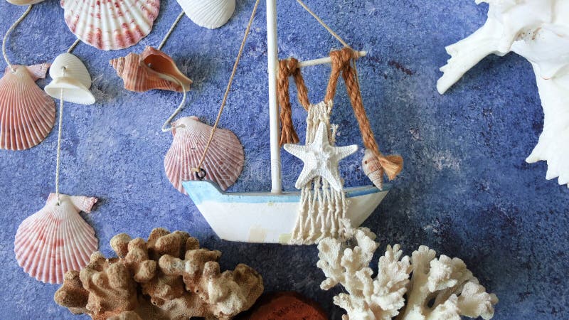 Top View Boat with Seashell, Conch Shell on Blue Background, Stock ...