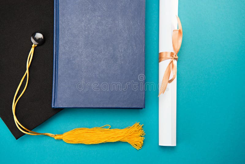 Top View of Book, Graduation Cap and Diploma on Blue Stock Image ...