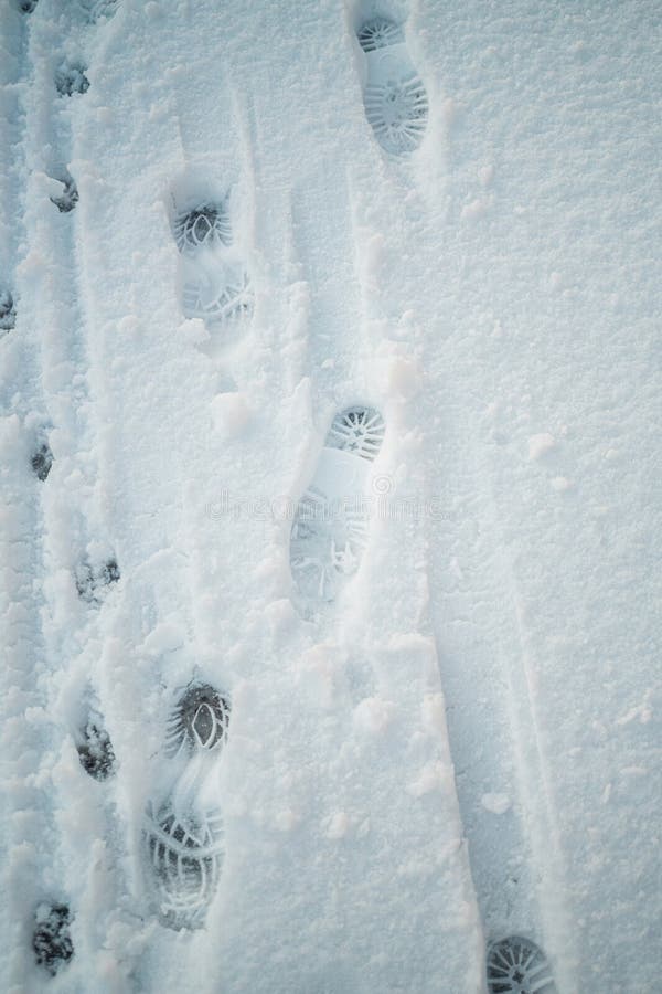 Top View of Boot Footprint in the Snow Stock Photo - Image of elemental ...
