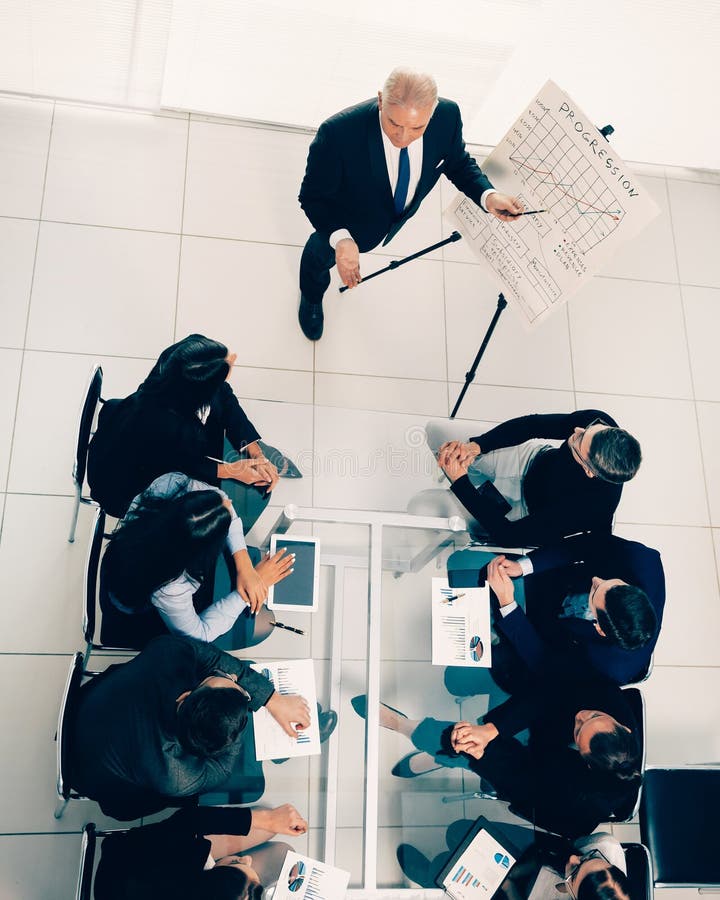 Top View. Boss at a Meeting with the Business Team Stock Image - Image ...