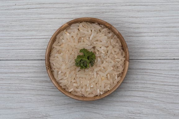 Top View of a Bowl of Rice on a Wooden Surface Stock Photo - Image of ...