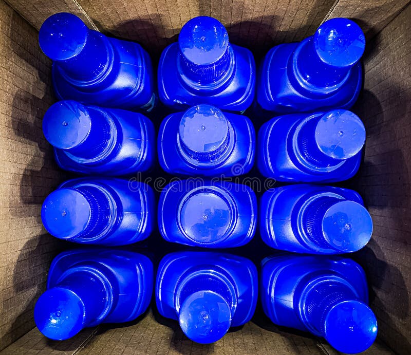 Top View of a Box with Blue Bottles. Stock Image - Image of light ...