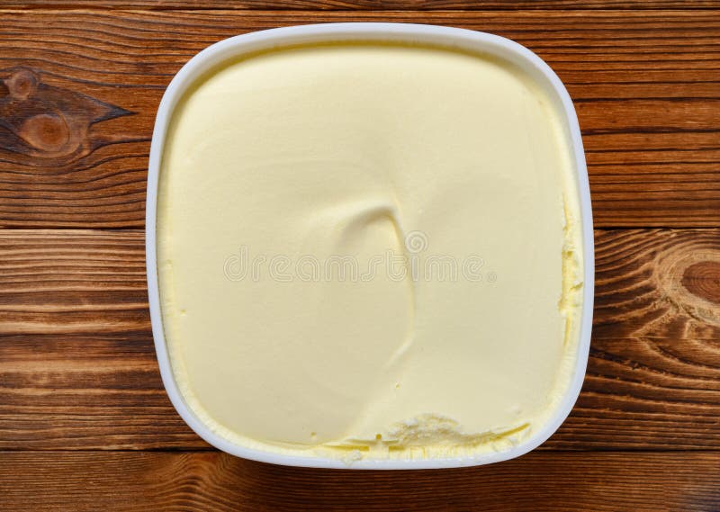 Box of Vanilla Flavor Ice Cream on a Wood Table Stock Image - Image of ...