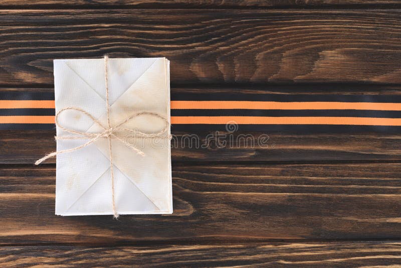 Top View of Box Wrapped by String and St George Ribbon on Wooden Planks ...