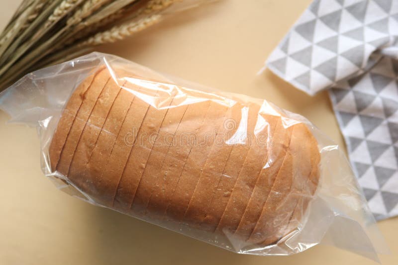 Top View of Bread in a Plastic Packet on Table Stock Photo - Image of ...