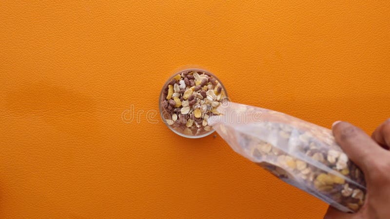 Top View of Breakfast Cereal Pouring from a Plastic Packet , Stock ...