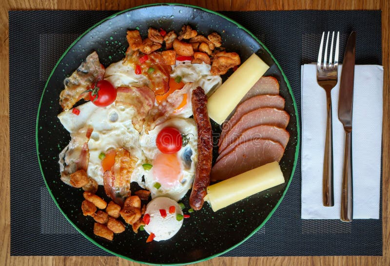 Top View of Breakfast Plate with Omelet and Sausages Stock Photo ...