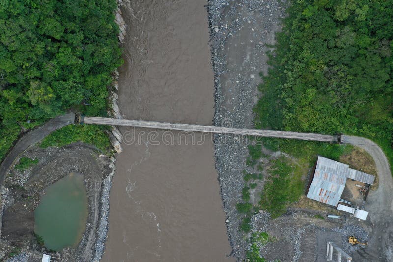 Top View of a Bridge Leading Over a River with a House Next To it Stock ...