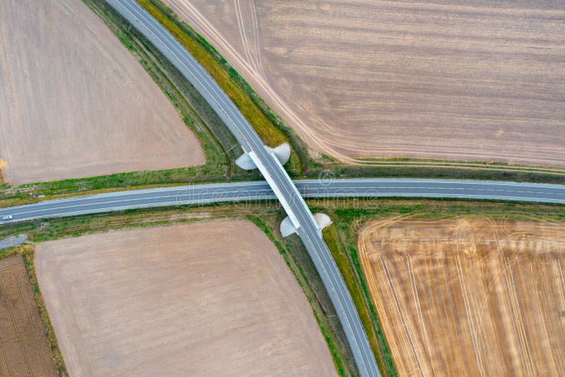 Top View of Bridge Road Over Green Fields Stock Photo - Image of fields ...