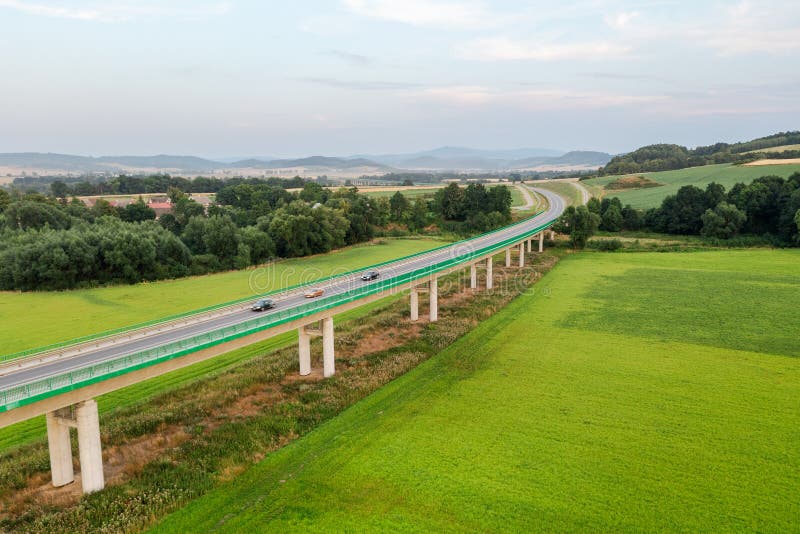 Top View of Bridge Road Over Green Fields Stock Photo - Image of drone ...