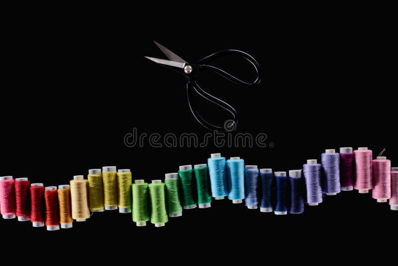 Top View of Bright and Colorful Threads and Scissors Isolated on Black ...