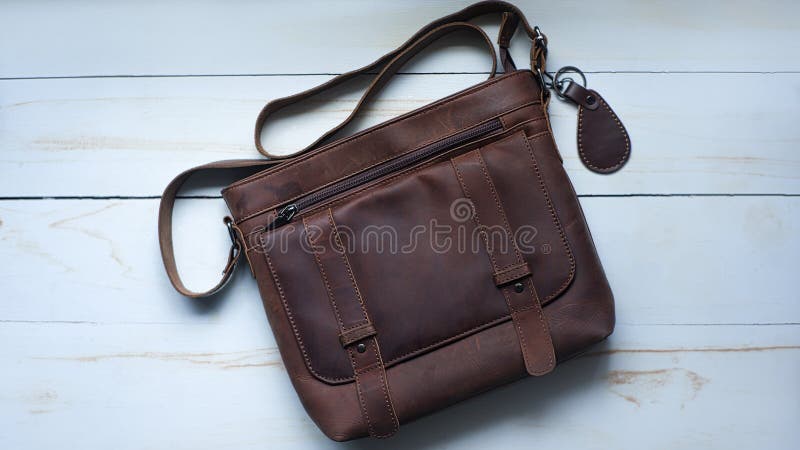 Top View Brown Leather on a White Wooden Table Stock Image - Image of ...