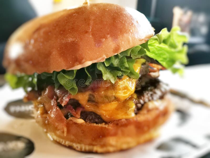 Top View Burger with Sauce and French Frieson the Wooden Background ...