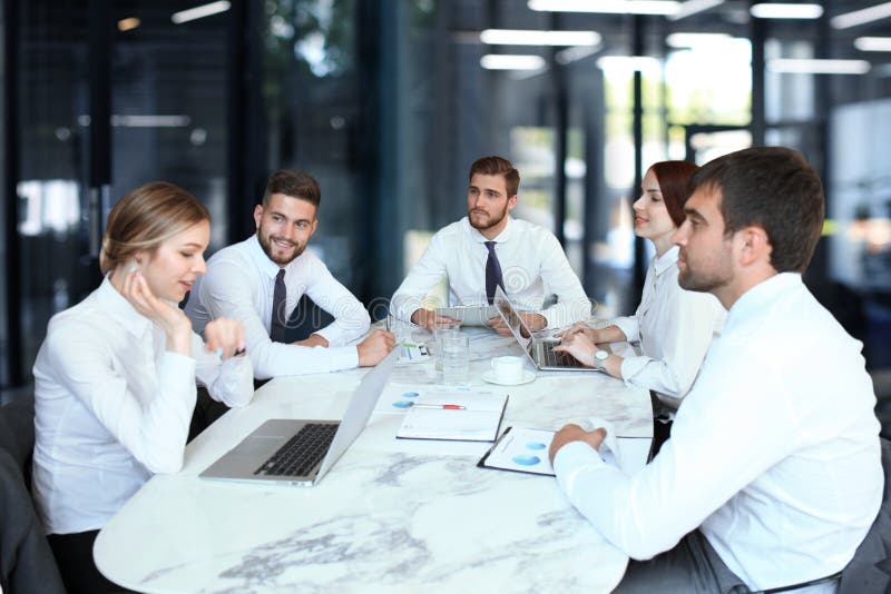 Top View of Business People Working Together while Spending Time in the ...