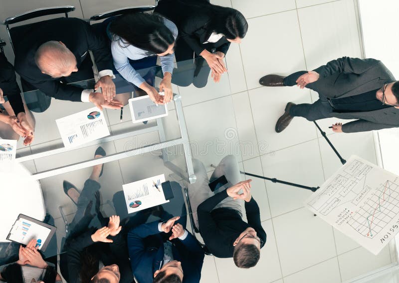 Top View. Business Team Applauding the Speaker after the Business ... Top View. Business Team Applauding the Speaker after the Business ...