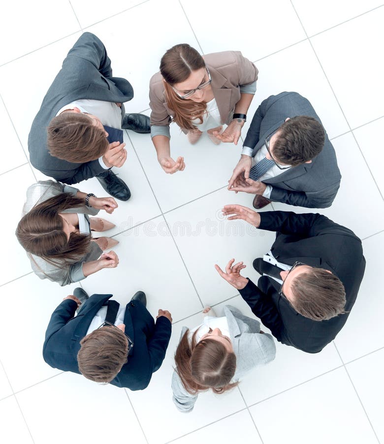 Top View.business Team Discussing Something Standing in a Circle Stock ... Top View.business Team Discussing Something Standing in a Circle Stock ...