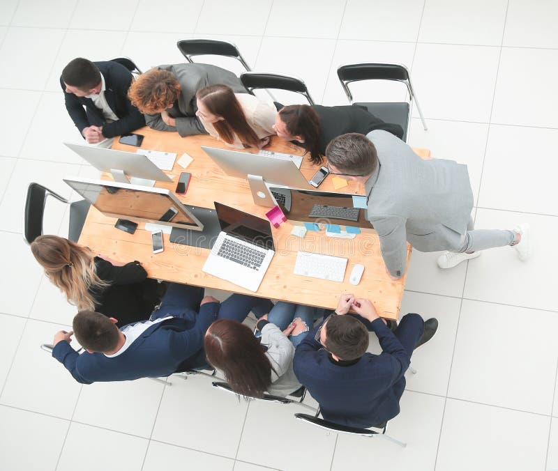 Top View. Business Team Sitting at the Desk Stock Image - Image of ...