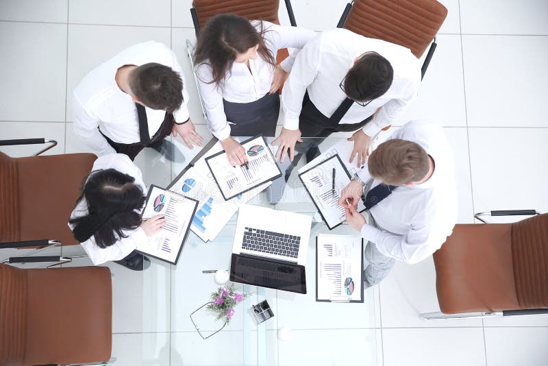Top View. Business Team Standing Near the Desktop Stock Image - Image ...