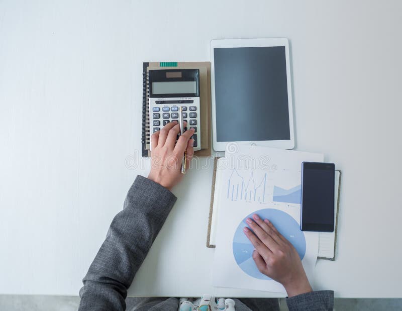Top View Businessman`s Hand is Calculating Financial Data in an Office ...