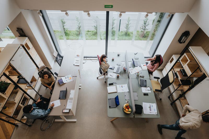 A Top View of a Bustling Modern Office Space with a Diverse Team of ...