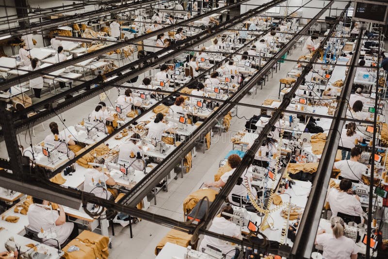 Top View of a Busy Textile Sewing Factory with Female Workers Editorial ...