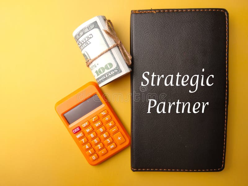 Top View Calculator,banknotes and Notebook with Text Strategic Partner ...