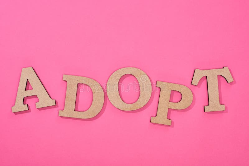 Top View Cardboard Word Adopt Pink Background Stock Photos - Free ...
