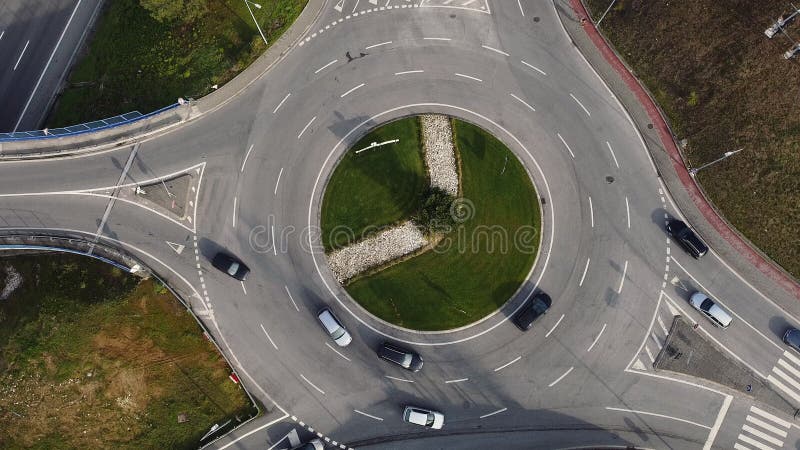 Top View of Cars Driving on a Roundabout Road Stock Video - Video of ...