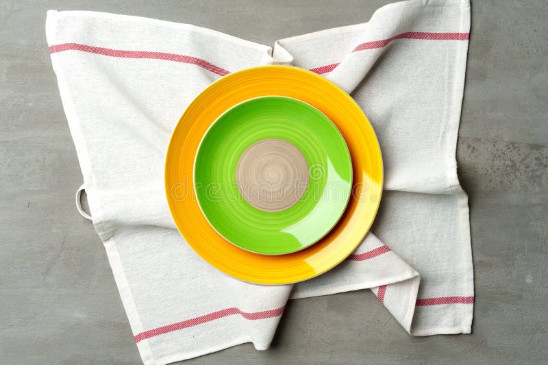 Top View of Ceramic Plate with Table Napkin on Gray Background Stock ...
