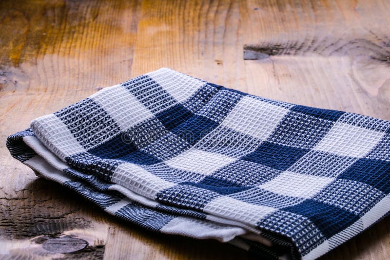 Top View of Checkered Kitchen Towels on Wooden Table Stock Photo ...