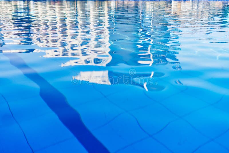 Top View of a Checkered Pool Filled with Water Reflecting the ...