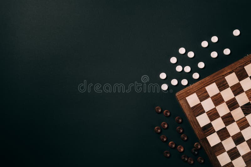 Top View of Checkers by Checkerboard Stock Image - Image of ...