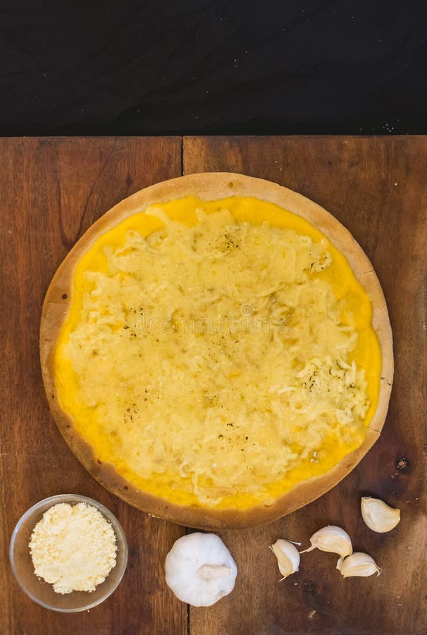 Top View of Cheesy Garlic Pizza with Separate Ingredients Stock Image ...