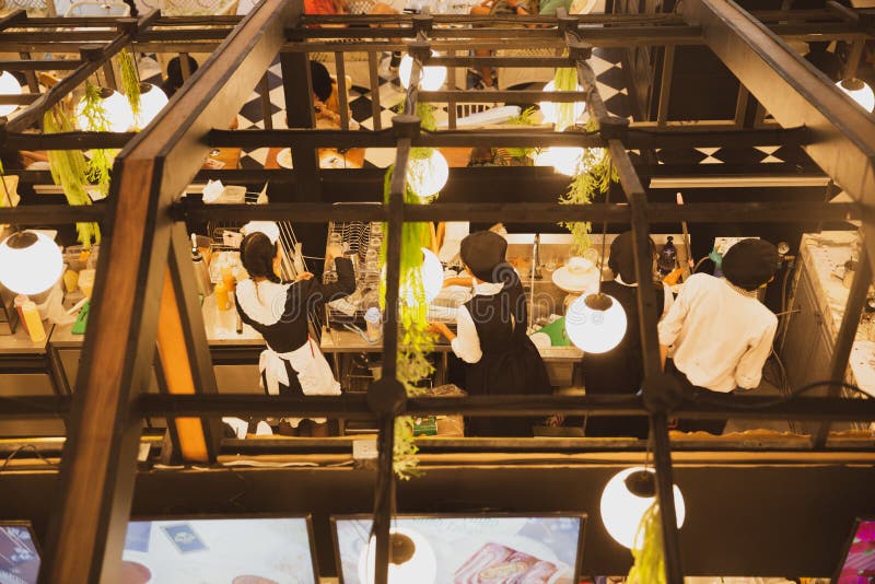 Top View of Chefs and Staff Working in the Open Kitchen. Editorial ...