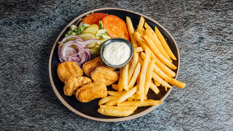 Top View of Chicken Nuggets, Fries, Veggies, and Mayo Stock Image ...